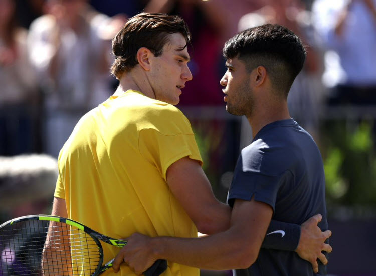 Carlos Alcaraz reacts after losing a tough match vs. Jack Draper with Wimbledon on his mind ...