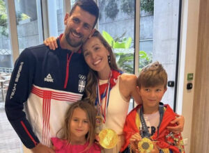 Novak Djokovic poses with the gold medal with his beautiful family ...